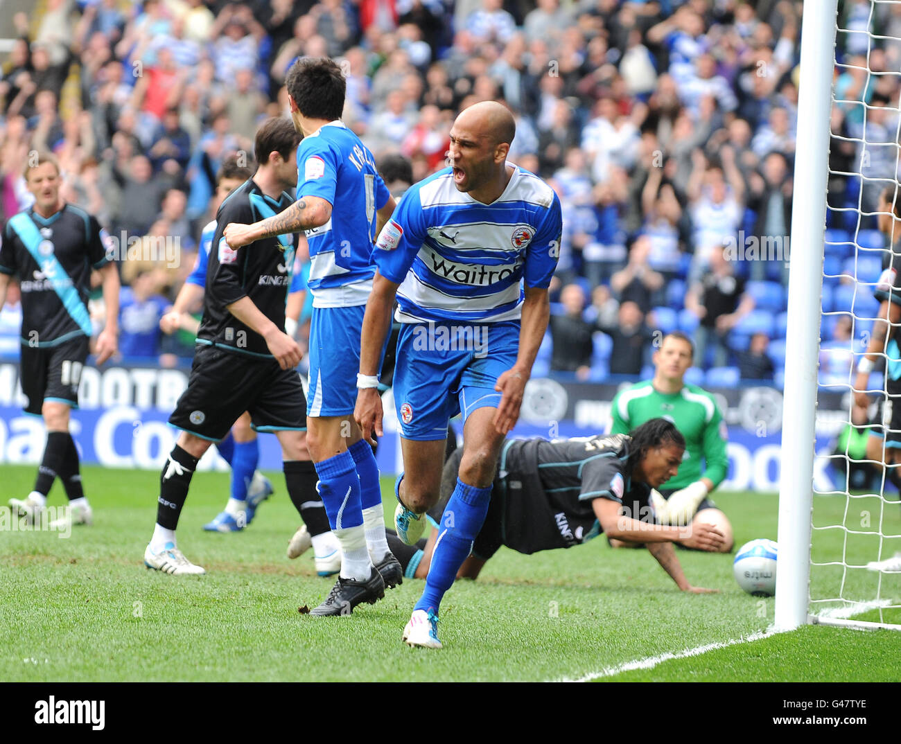 Reading's Jimmy Kebe (right) celebrates after scoring their first goal ...