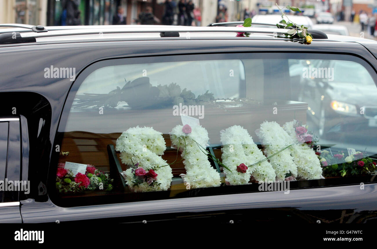 A hearse carrying the coffin of Sian O'Callaghan makes it's way along ...