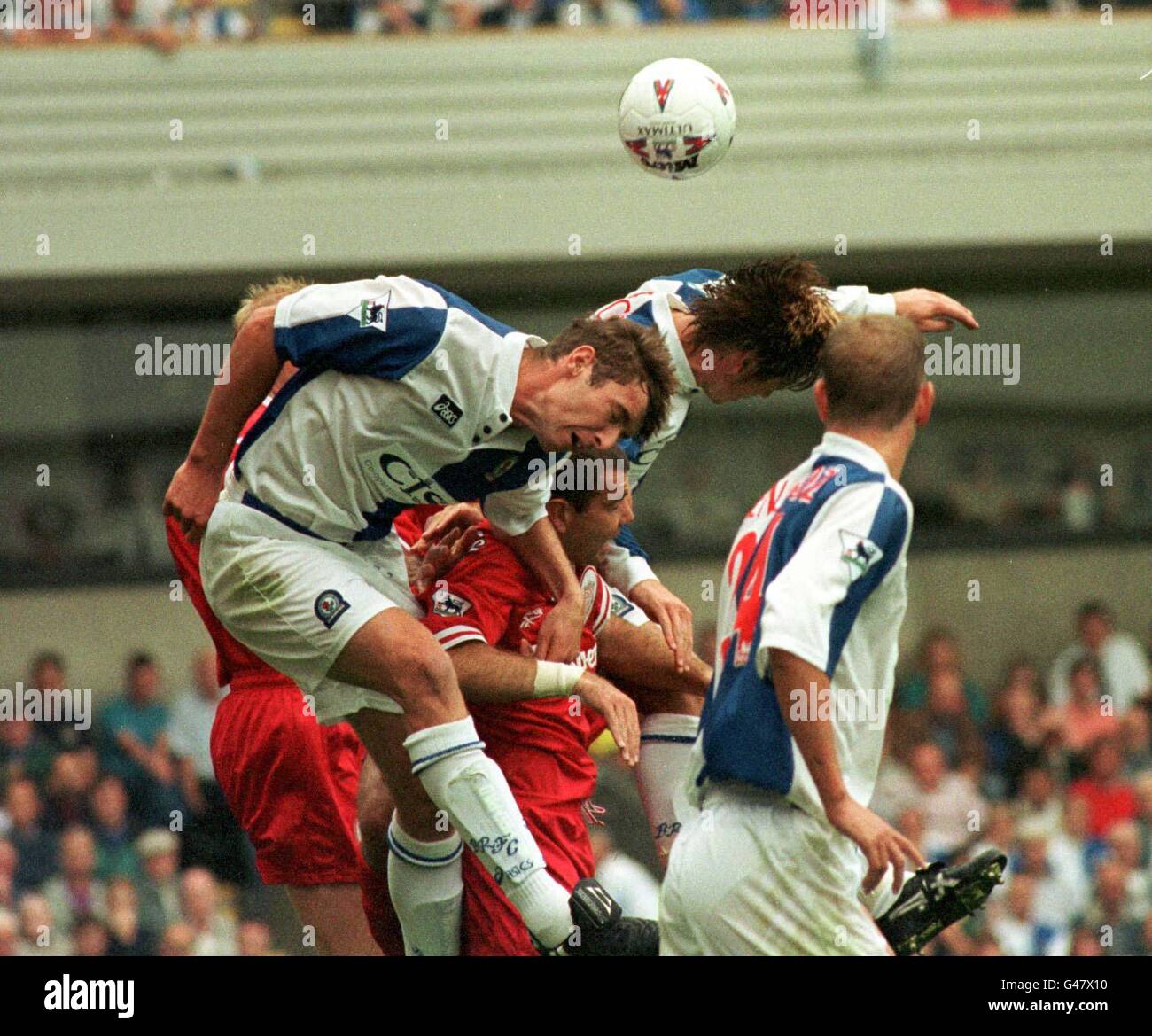 Blackburn's Sutton (front left) and Flitcroft rise above the Liverpool ...