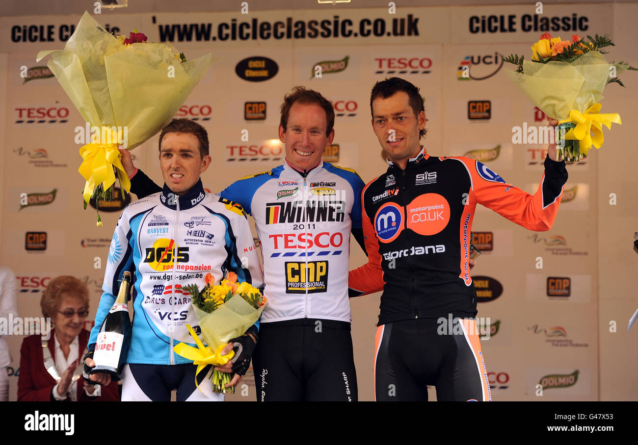 Rapha Condor Sharp's Zakkari Dempster (centre) winner of the 2011 CiCLE Classic poses with ...