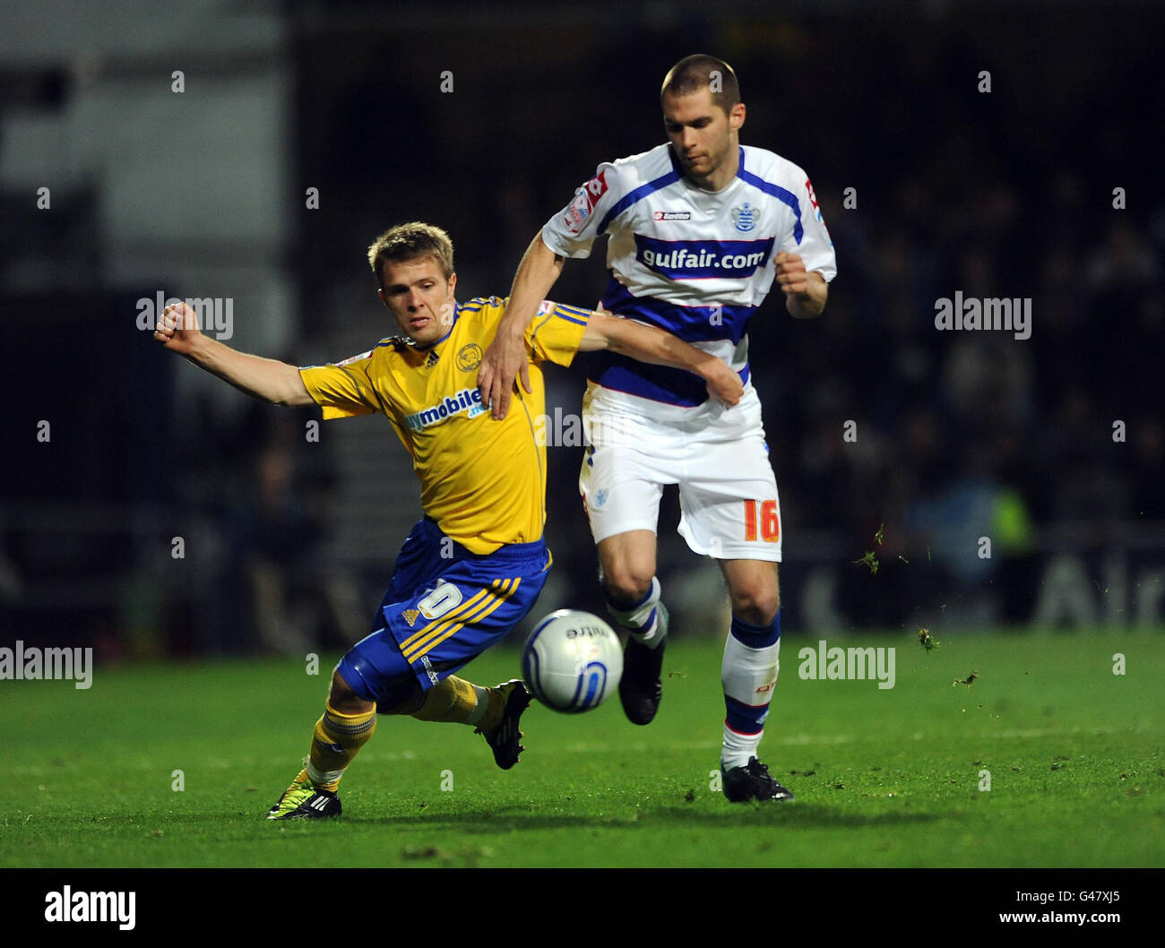 Derby County's Jamie Ward and QPR's Matthew Connolly (right) battle for ...
