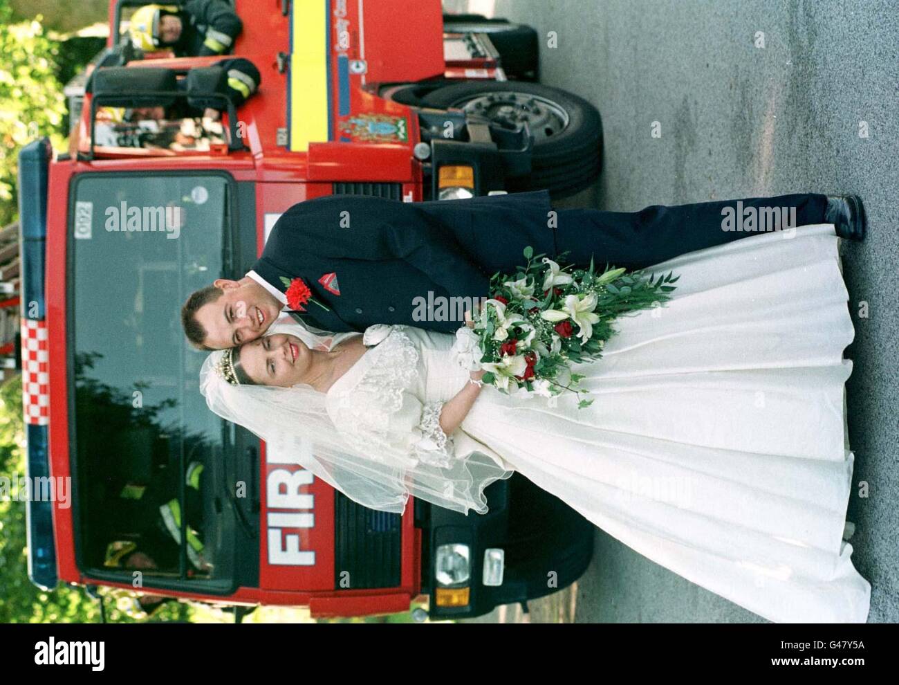WEDDING Fire/bride and groom Stock Photo - Alamy