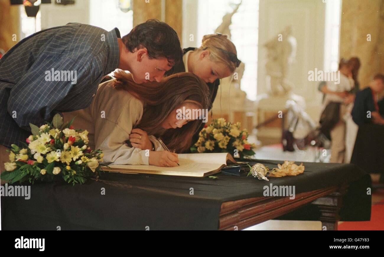 Emma Lock, 14, watched by Richard Haworth, 18, and Sarah Lock, 11 ...
