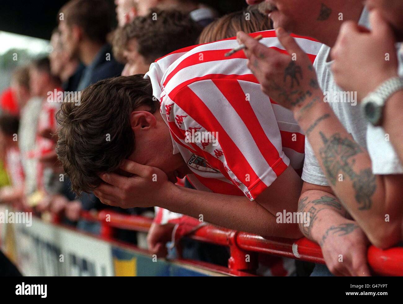 A Sunderland fan shows his emotion as his team are relegated to the ... A Sunderland fan shows his emotion as his team are relegated to the ...