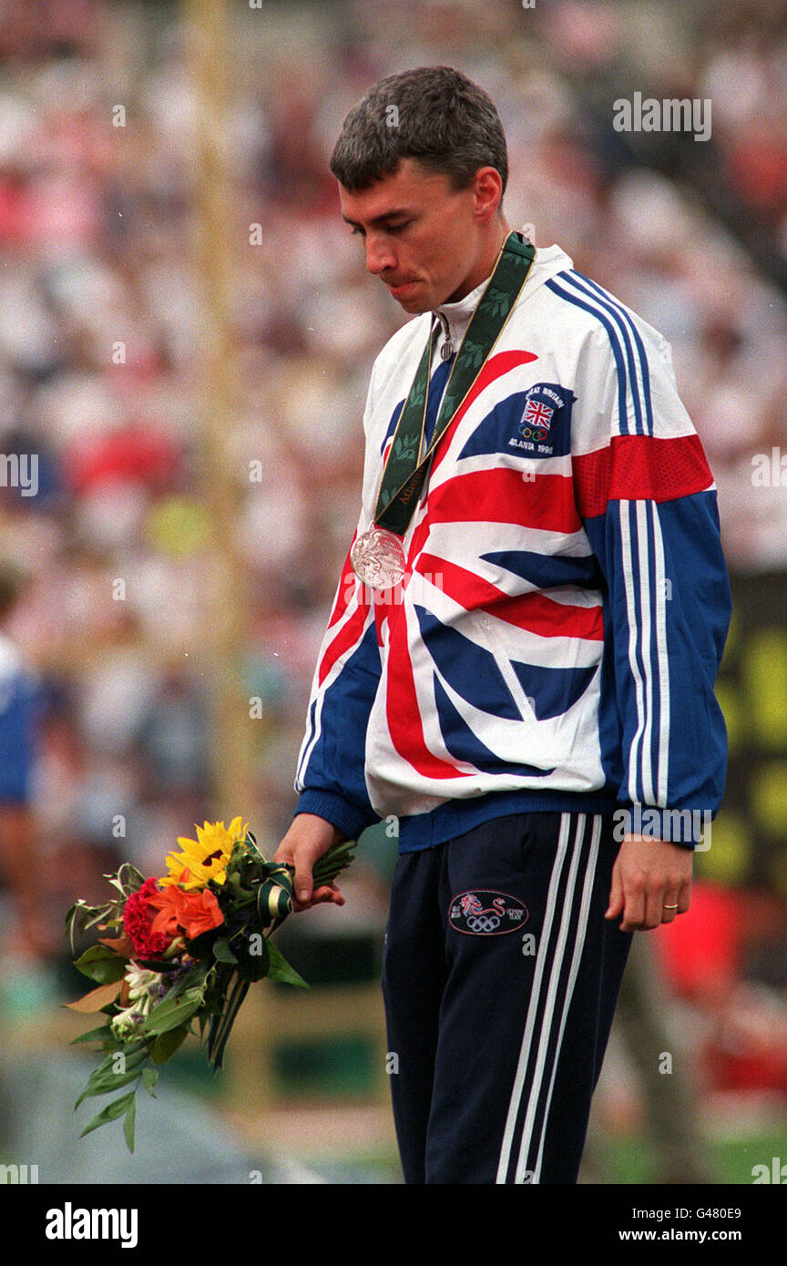 British triple jump world record holder Jonathan Edwards bites his lip ...