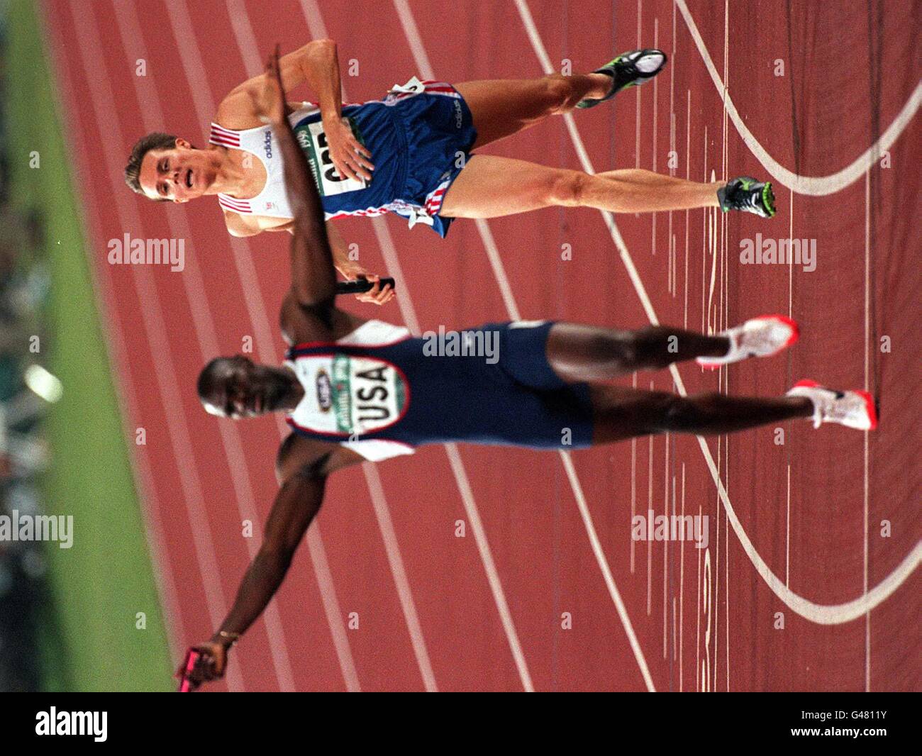 As America celebrates again, Britain Roger Black crosses the line to ...