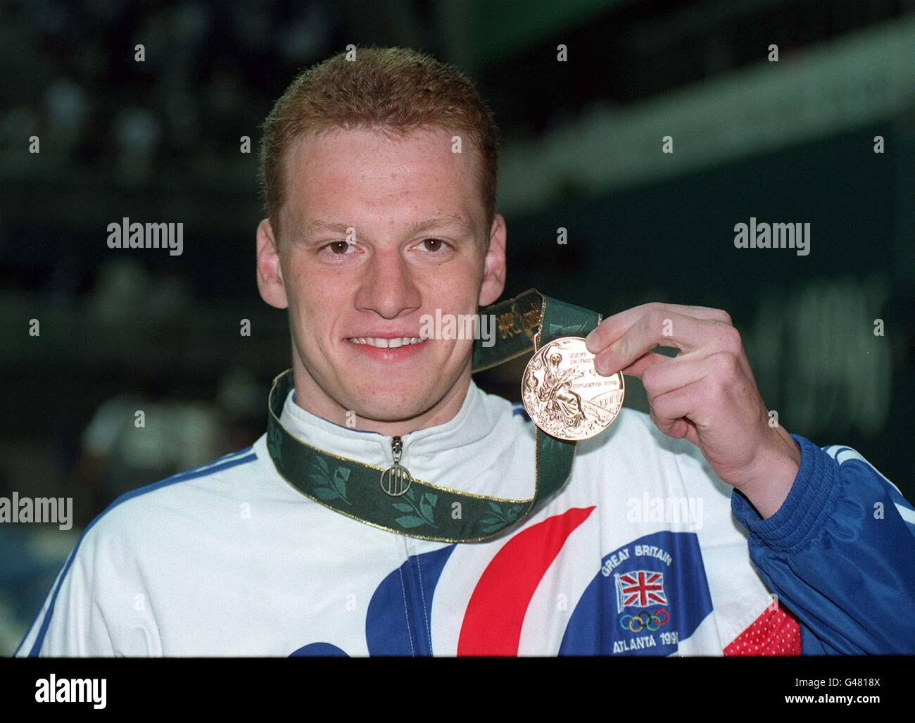 Britain's Graeme Smith , from Stockport, with his bronze medal this ...