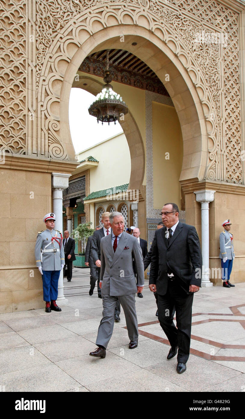 The Prince of Wales, walks alongside Director of Royal Protocol Mr ...