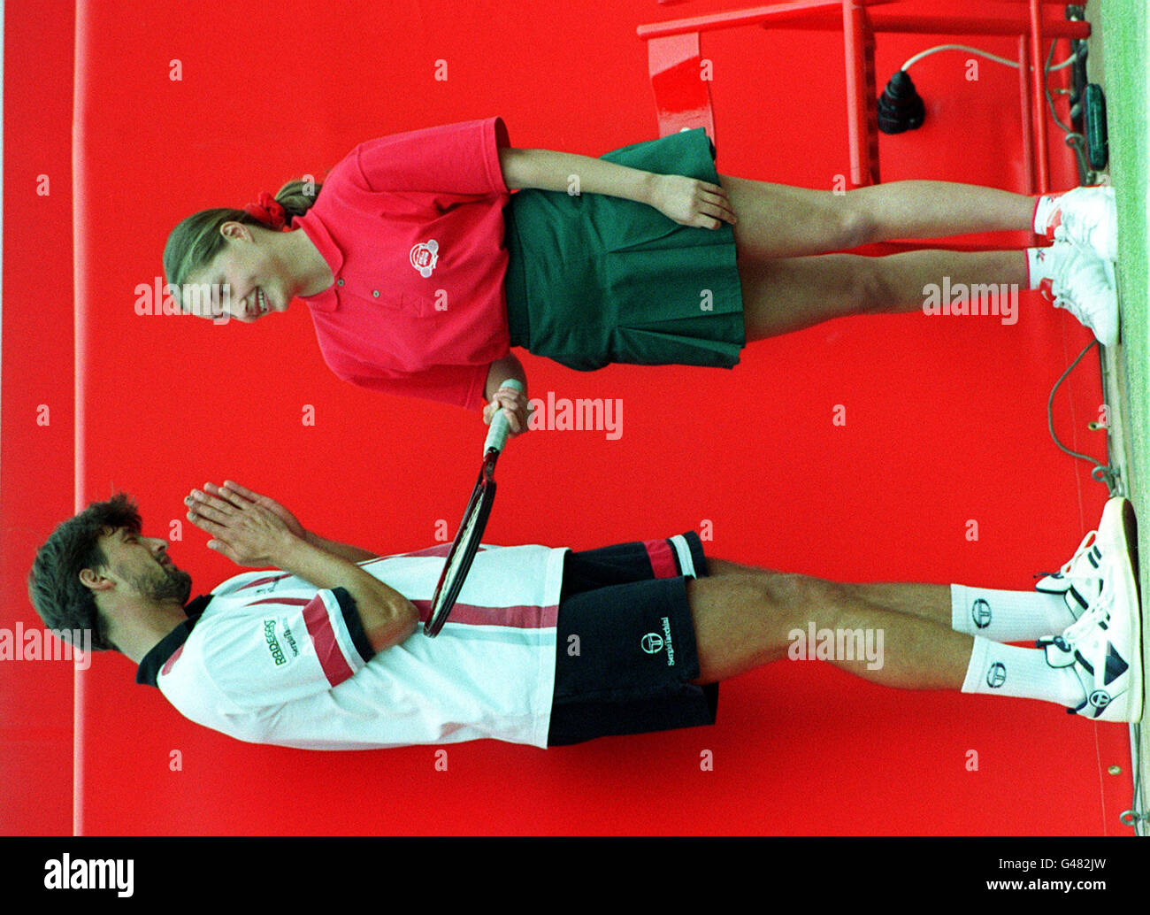 Croatia's Goran Ivanisevic pleads with ball girl Amy Kavanagh to help ...