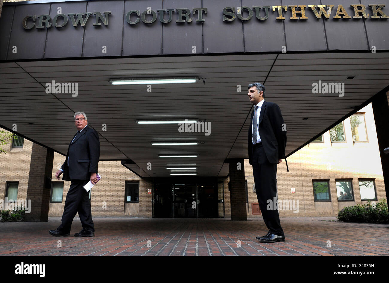 Former Labour MP Elliot Morley (left)leaves Southwark Crown Court where ...
