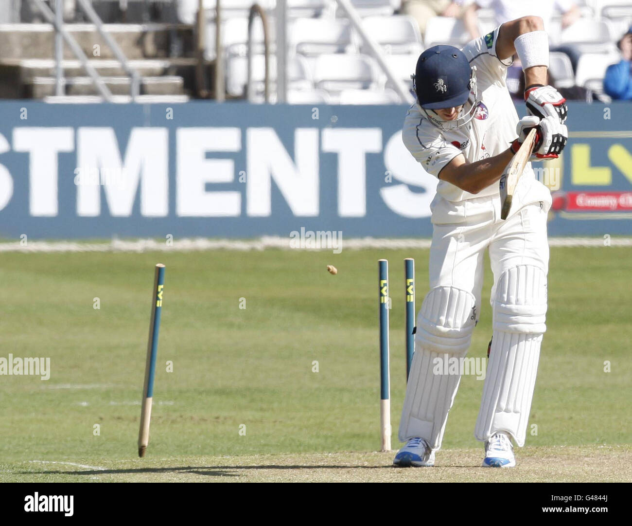 Kent's Joe Denly is bowled by Essex's Reece Topley during the Liverpool ...