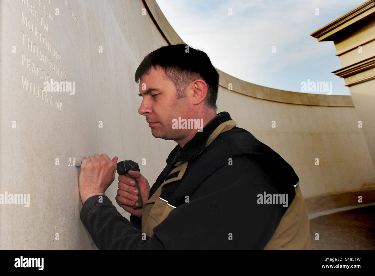 Nick Hindle prepares to engrave the names of 112 UK Servicemen and ...