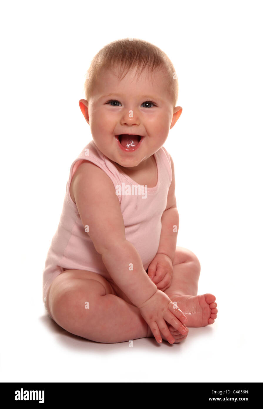 Baby girl laughing studio cutout Stock Photo - Alamy