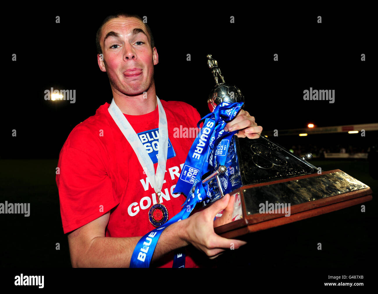 Crawley Town's Richard Brodie celebrates with the Blue Square Bet ...
