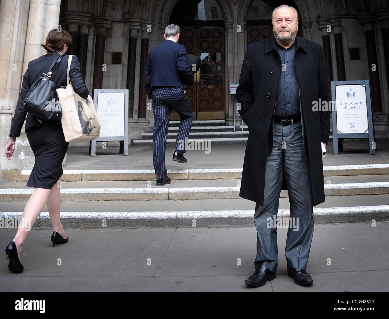 Former MP George Galloway arrives at the High Court in London where the ...