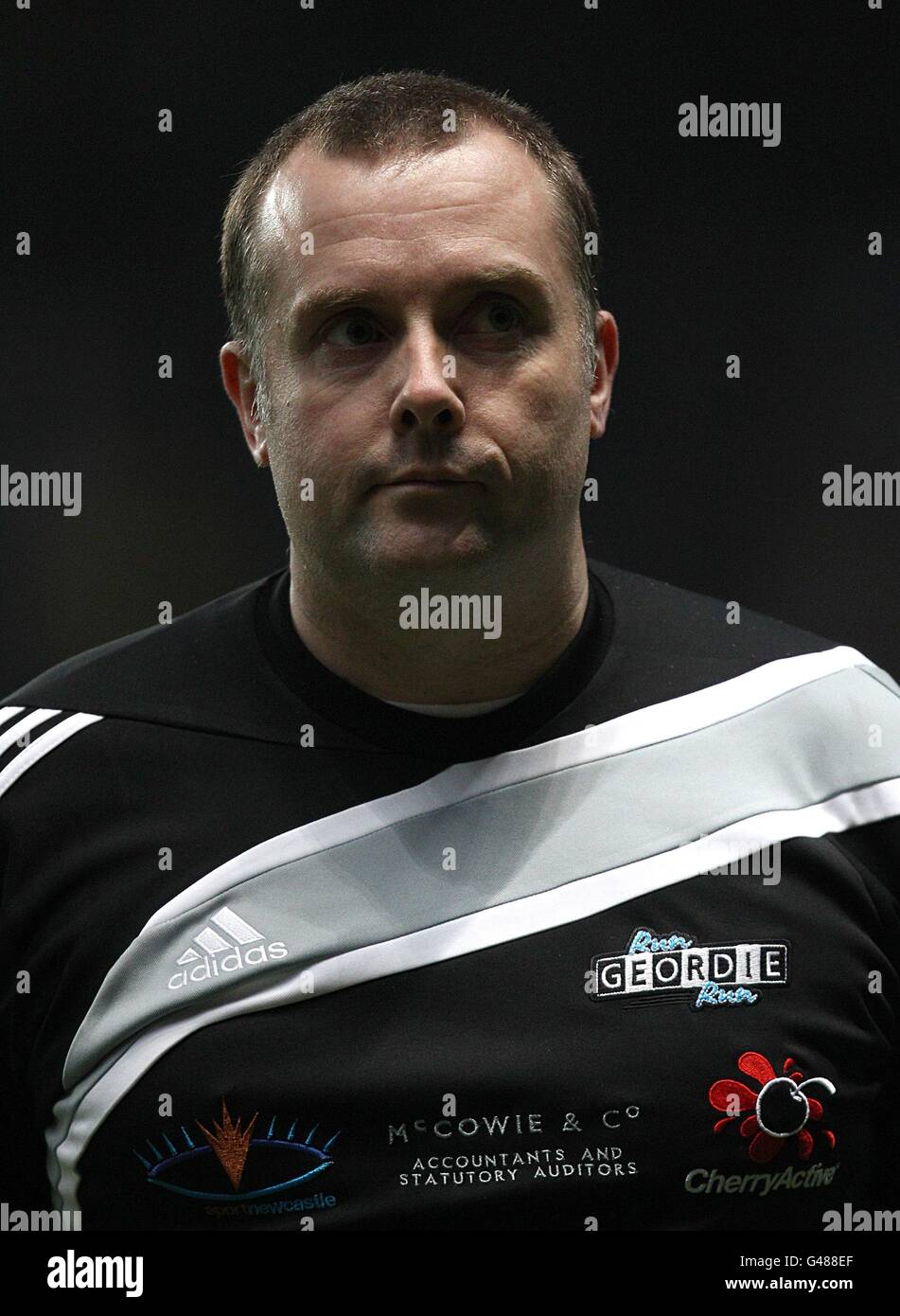 Mark Allison is paraded on the pitch before he begins his 'Run Geordie ...