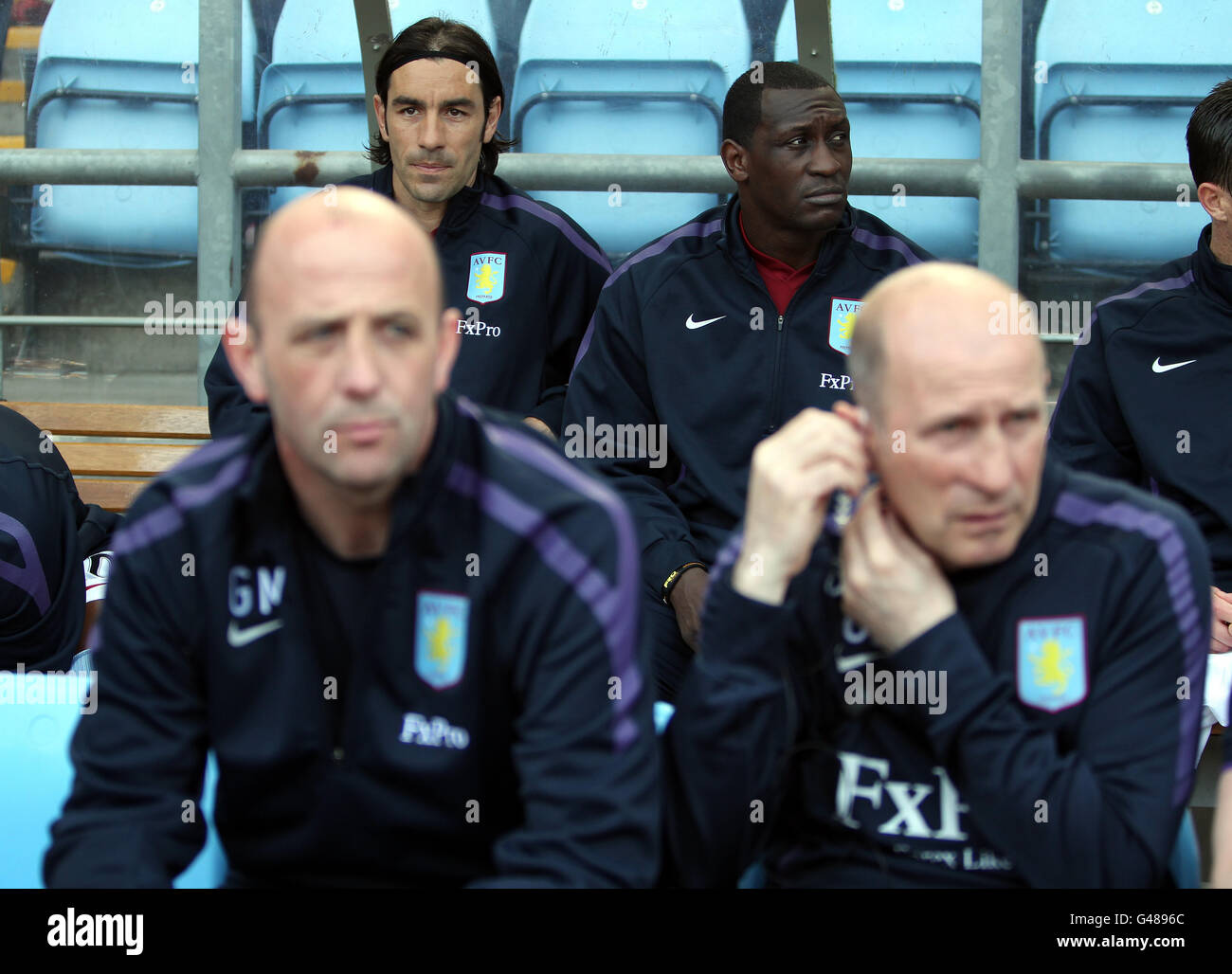 Robert Pires (back left) and Emile Heskey (back right) sit on the Aston ...