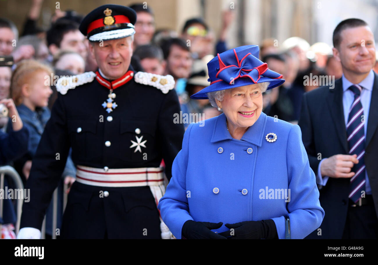 Queen Elizabeth II is greeted by crowds on her arrival at St John's ...