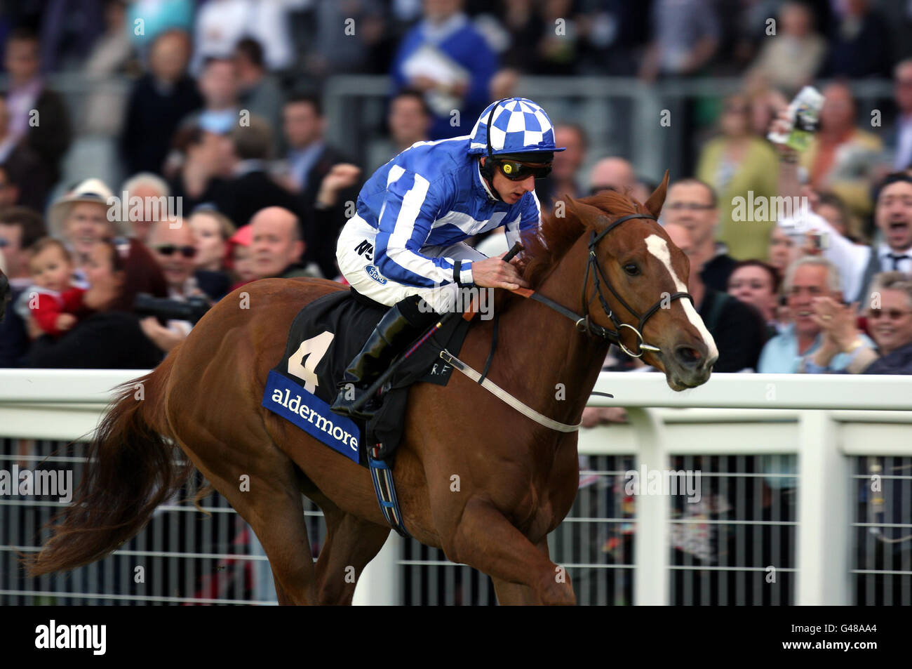 Miss Work of Art ridden by Paul Hanagan (blue)wins the Aldermore ...