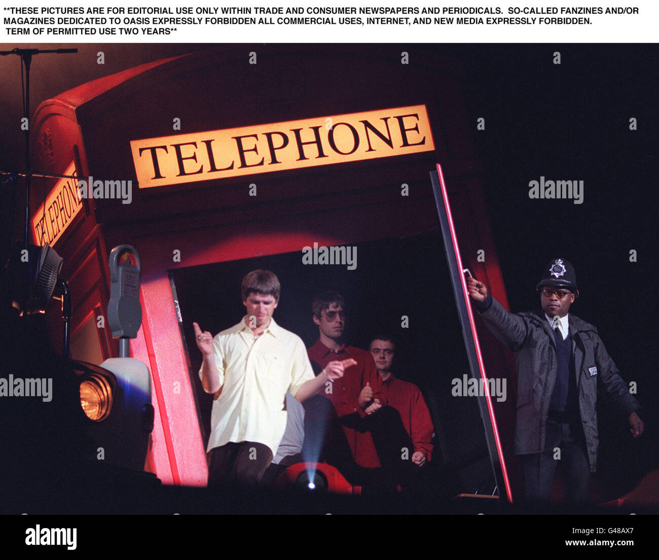 Oasis Earl's Court phone box Stock Photo - Alamy