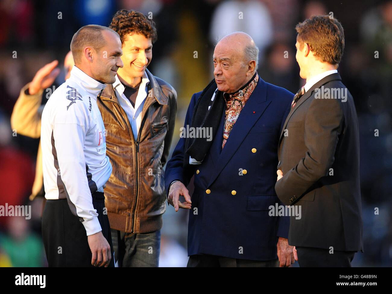 Fulham owner Mohamed Al Fayed (centre) with Fulham captain Danny Murphy ...