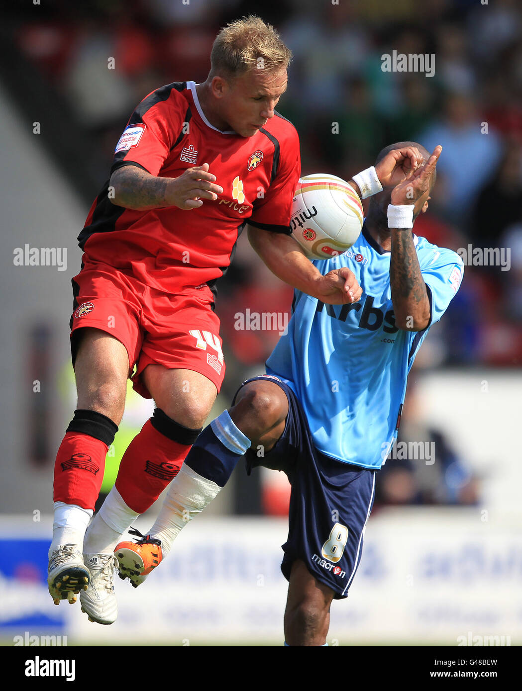 Walsall's Richard Taundry (left) and Charlton Athletic's Therry Racon ...