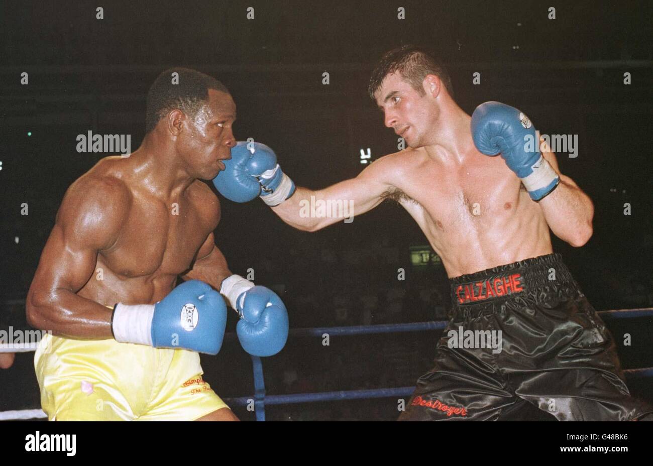 Chris Eubank (left) in action against Joe Calzaghe during the battle ...