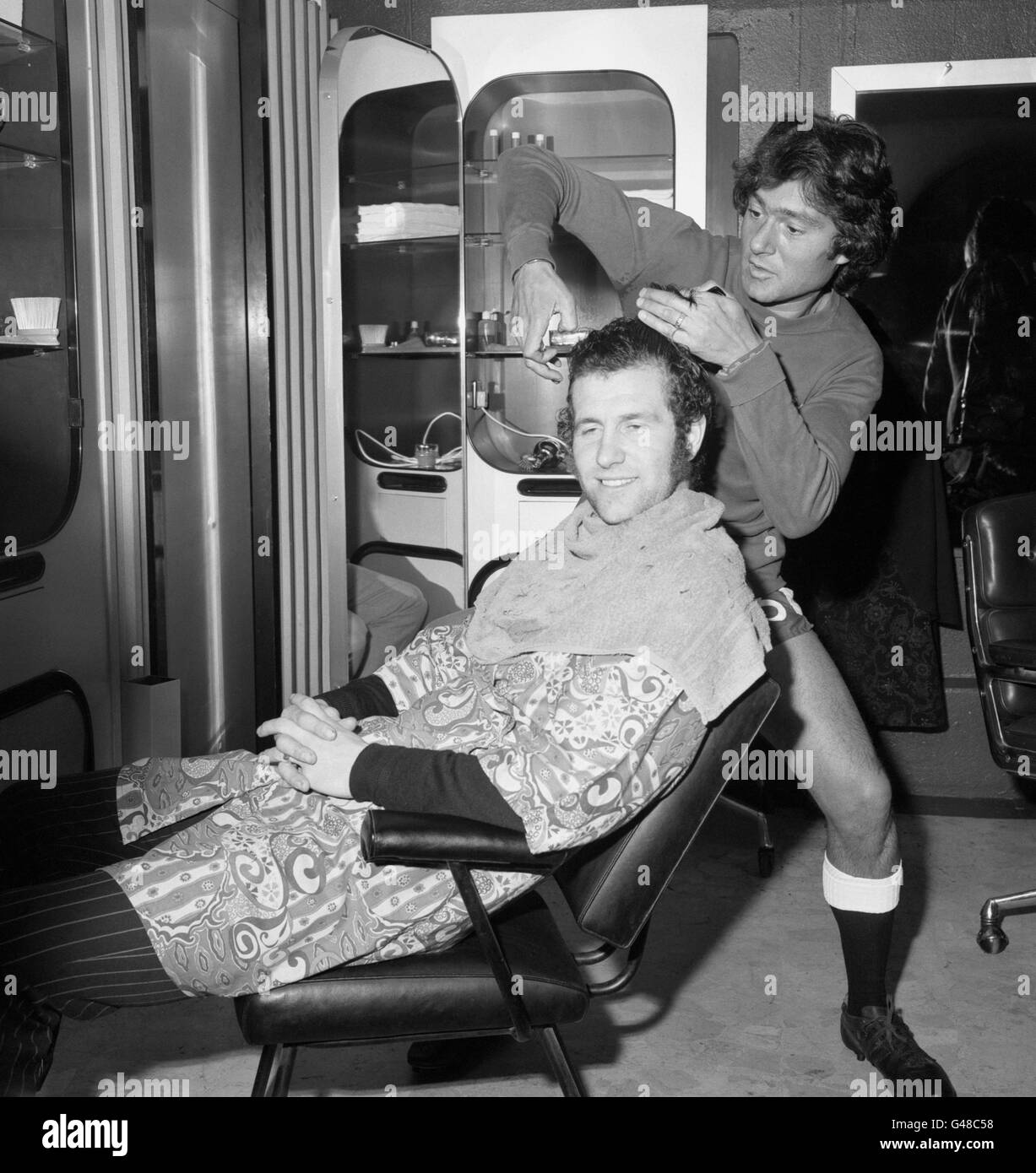 Chelsea striker Peter Osgood (r) pictured at Vidal Sassoon's Belgravia ...