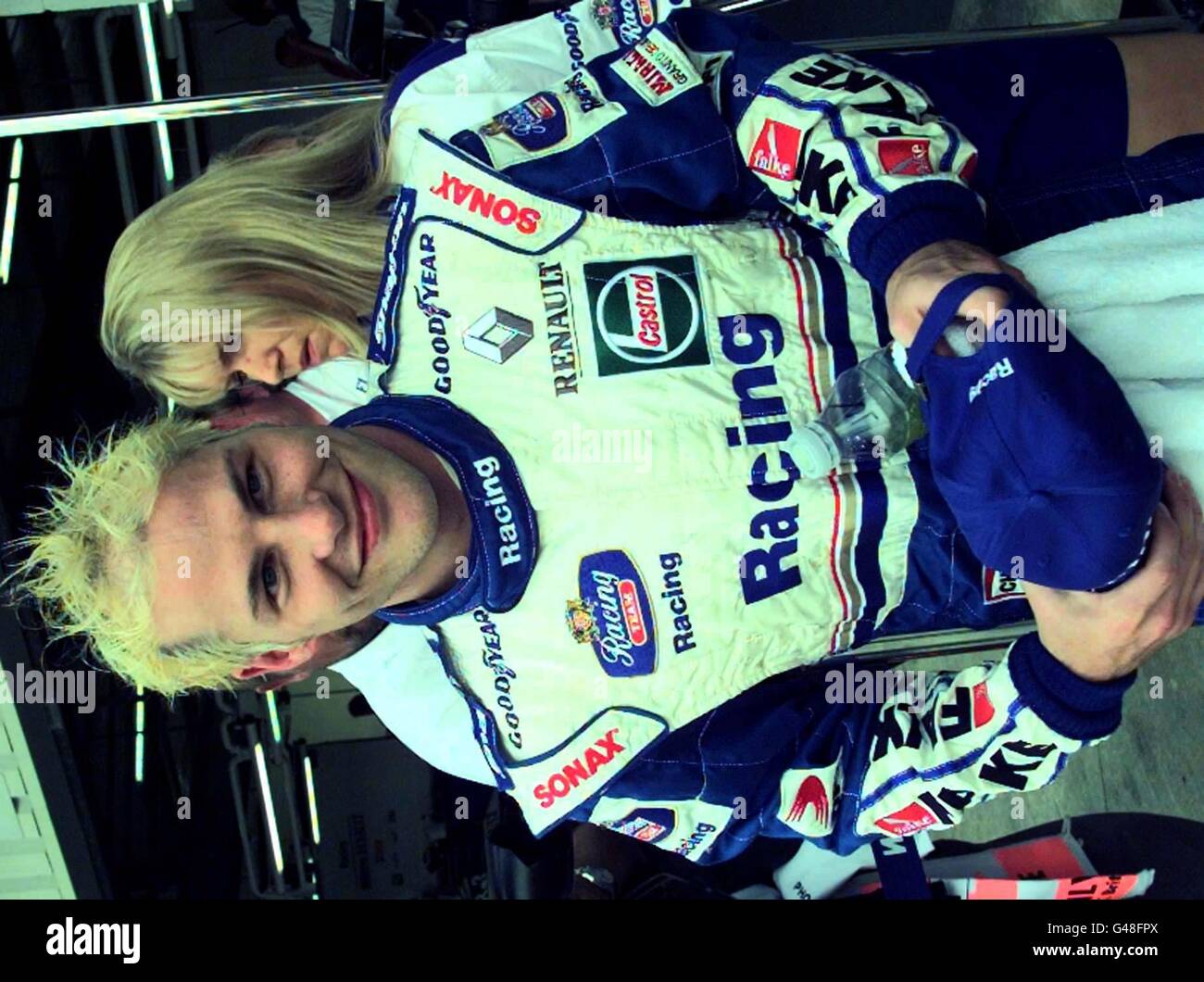 Canadian racing driver Jacques Villeneuve leaving the pit garage at ...