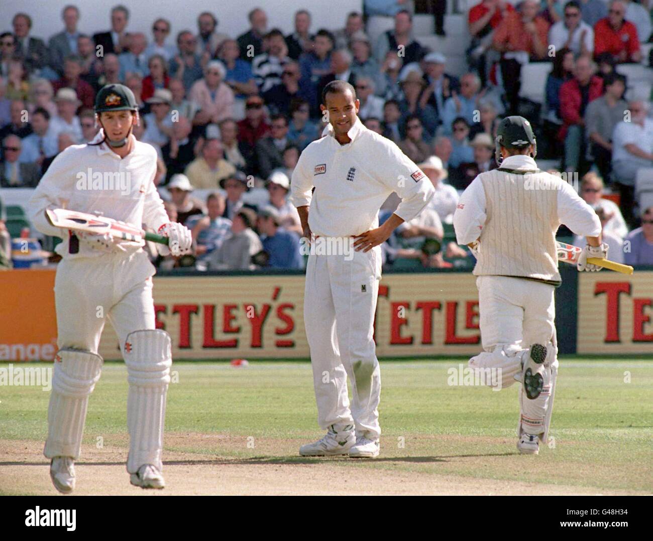 Stranded, Dean Headley of England can only watch as Mathew Elliott ...