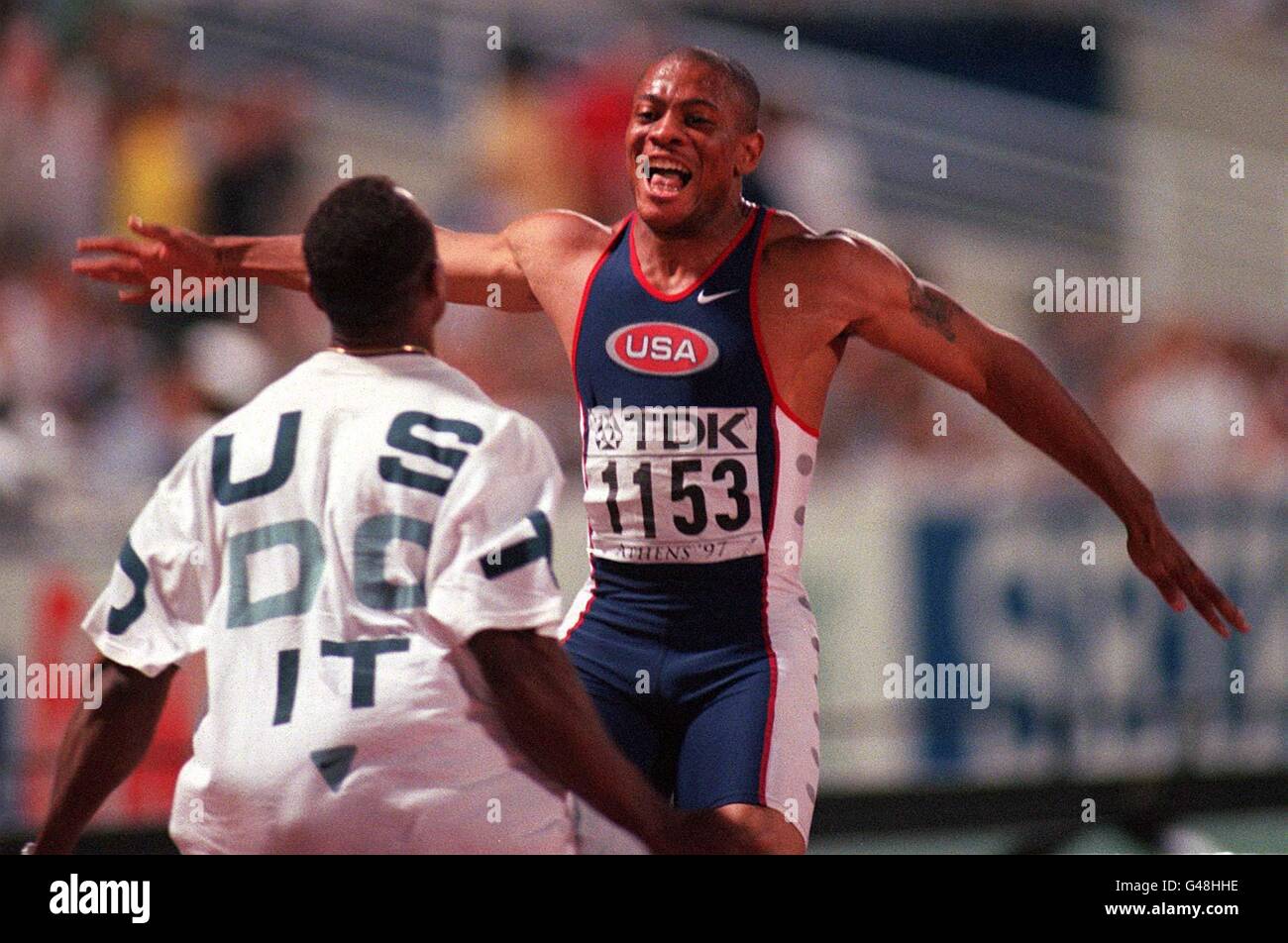 A delighted Maurice Greene of the USA runs to a friend after his ...