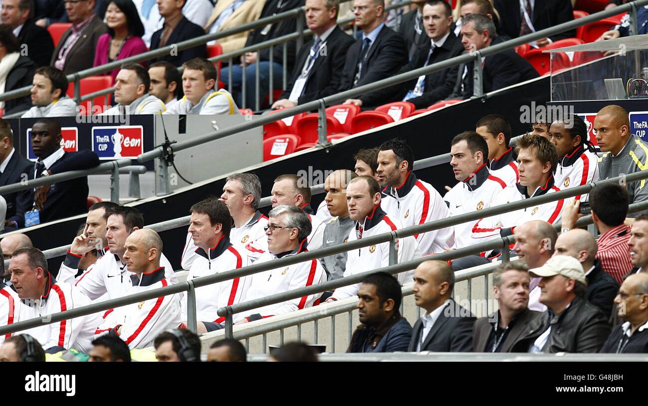 Manchester United's Wayne Rooney on the bench with the rest of the ...