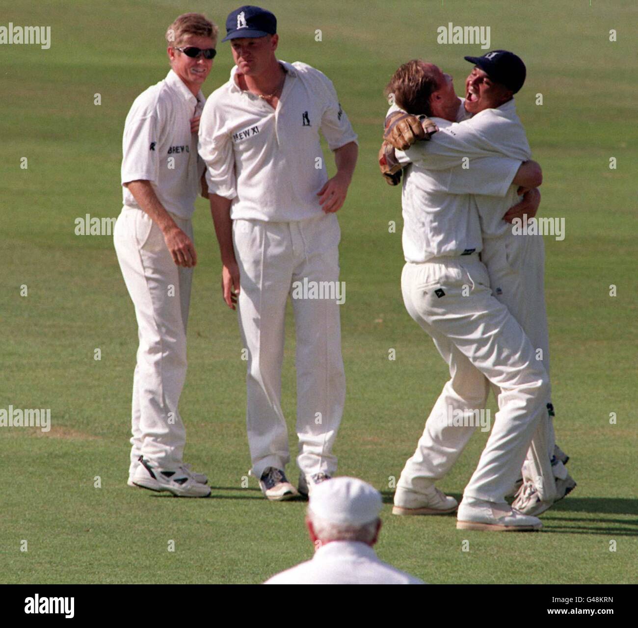 Warwickshire's wicket-keeper Keith Piper (right) celebrates with ...