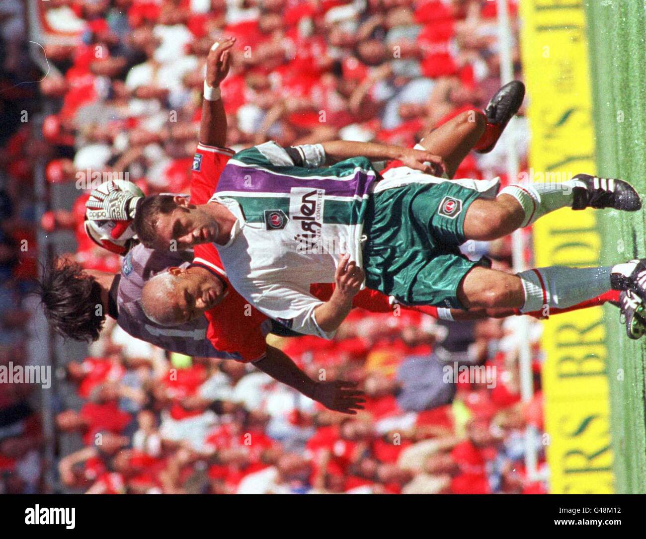 Middlesbrough's Ravanelli gets sandwiched between Charlton's Andy ...