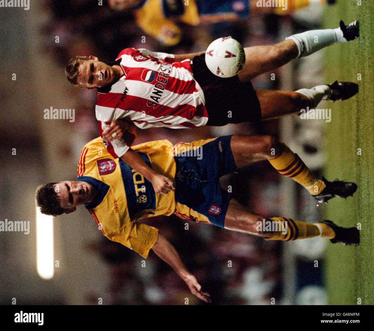Southampton's Kevin Davies gets a helping hand from Andy Linighan of ...