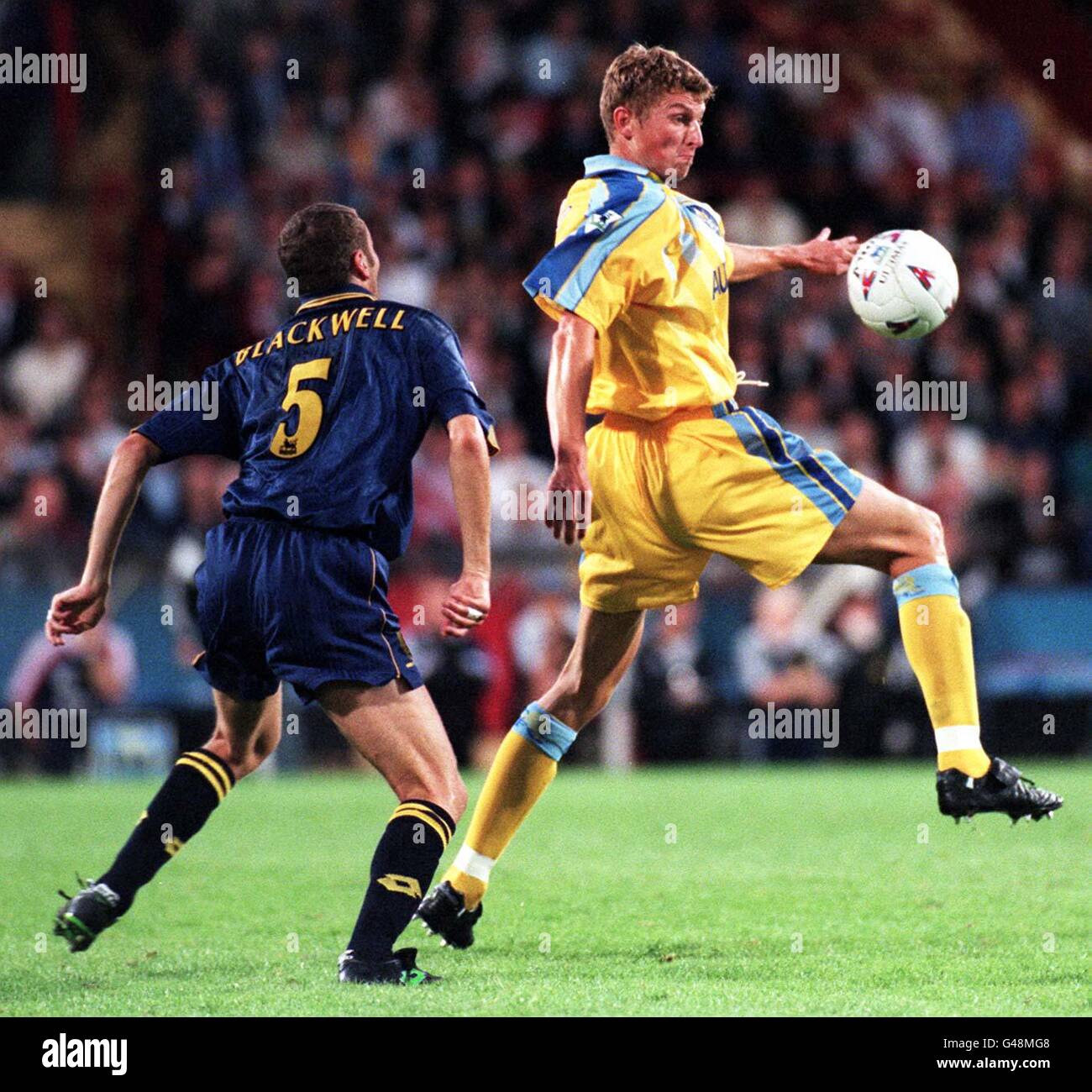 Chelsea's Norwegian signing Tore Andre Flo controls the ball from ...