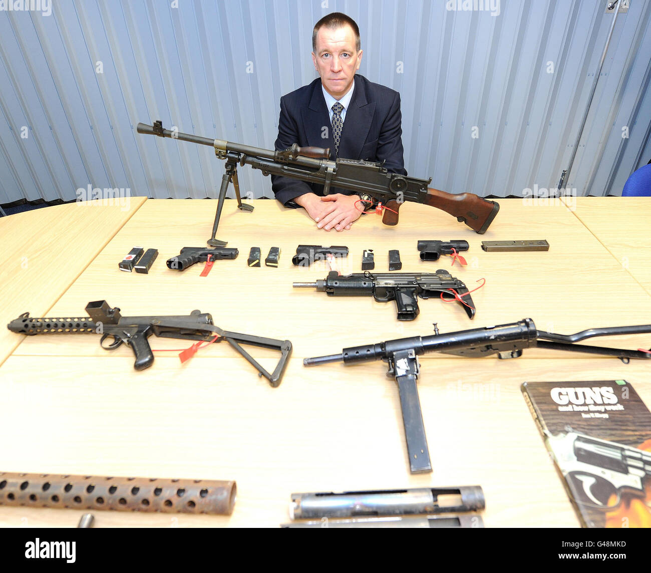 Detective Superintendent Paul Richardson with weapons seized by police ...
