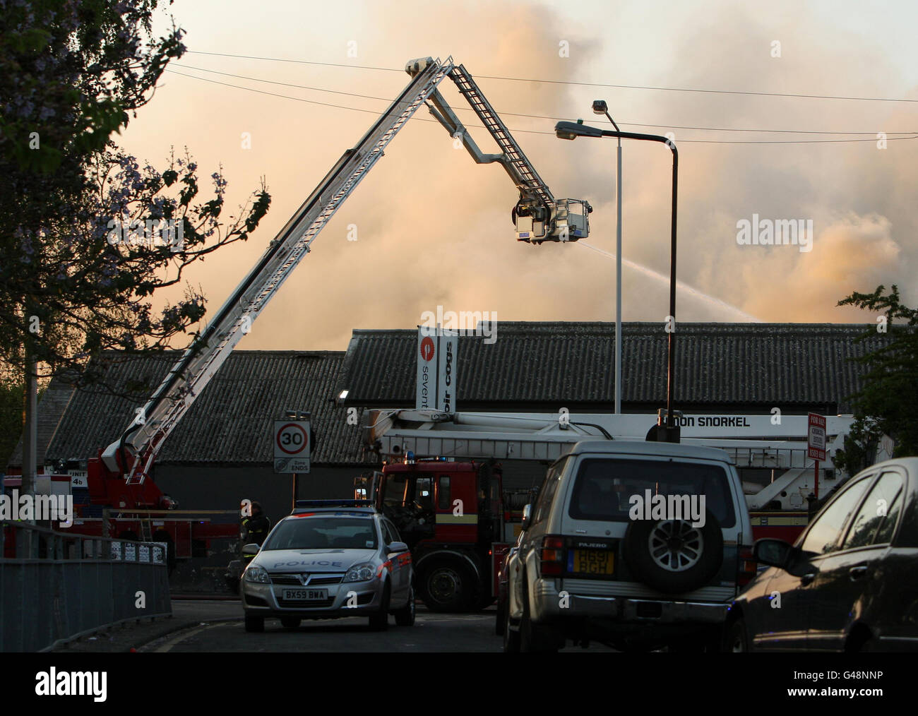 Firefighters at the scene of a fire in walthamstow hi-res stock ...