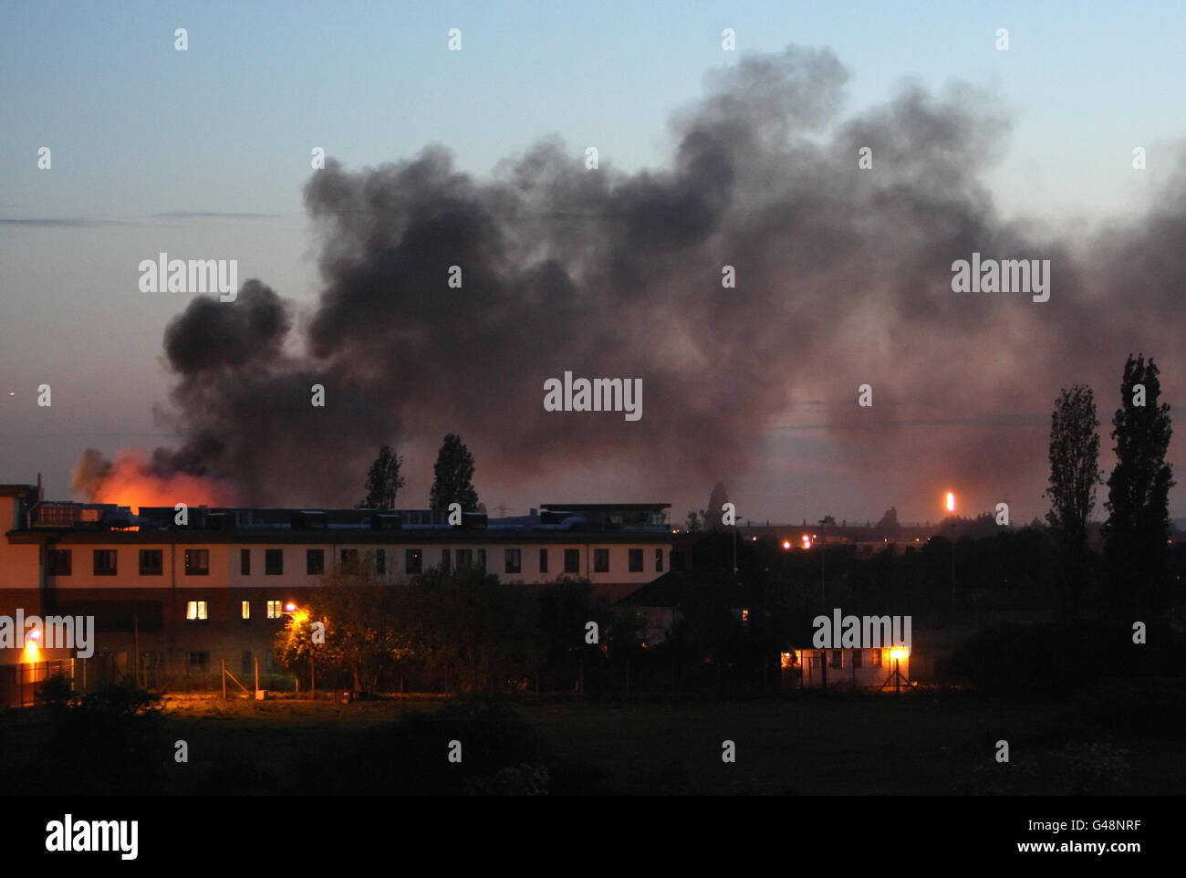 Smoke rises from the scene of a fire in Walthamstow, east London Stock ...