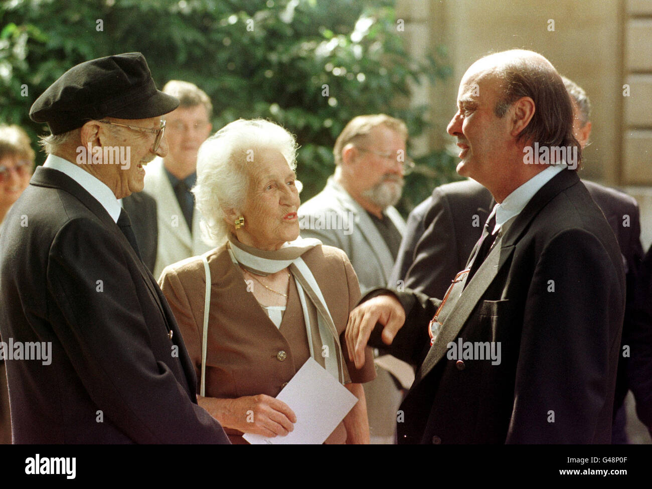Edna Dore and Dave Hill (R) at the funeral of Brian Glover at Brompton ...