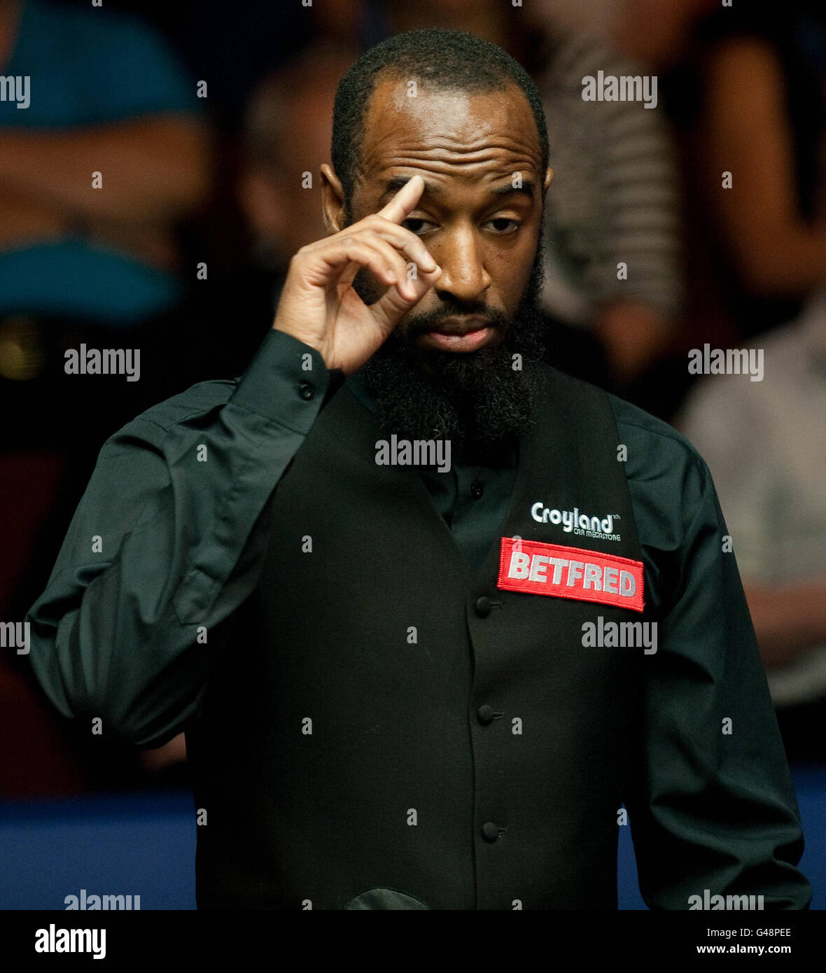 Rory McLeod in action against John Higgins during their second round ...