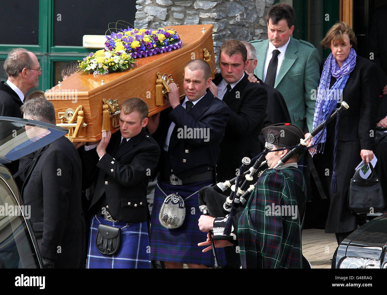David and Katie Taylor follow the coffin of their daughter Sophie from ...