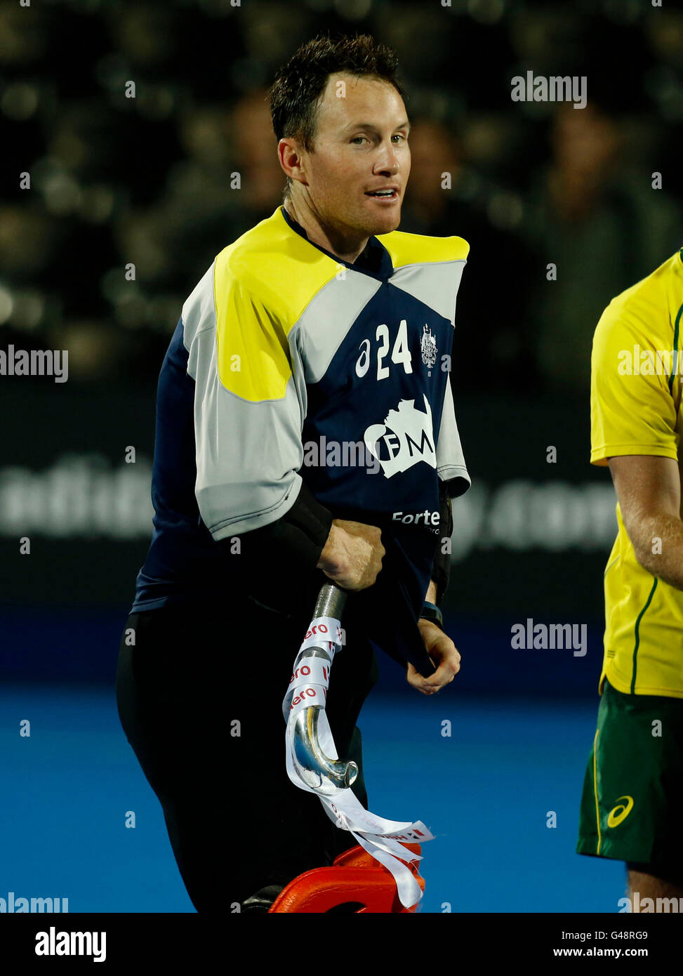 Australia goalkeeper Tyler Lovell pretends to steal the trophy after ...