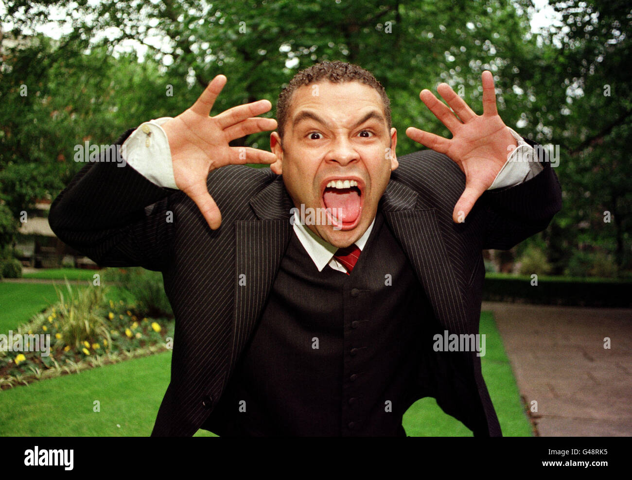 Comedian Craig Charles goes wild for the media during a news conference ...