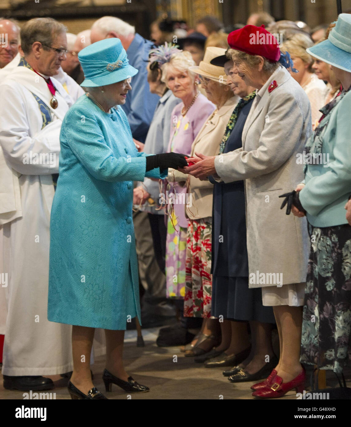 Queen Elizabeth II distributes Maundy Money during the traditional ...