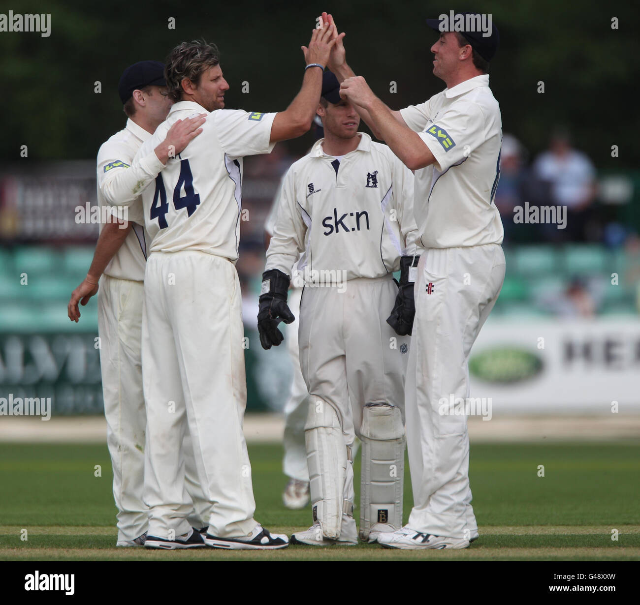 Warwickshire bowler Ant Botha celebrates with Ricky Clarke (right ...