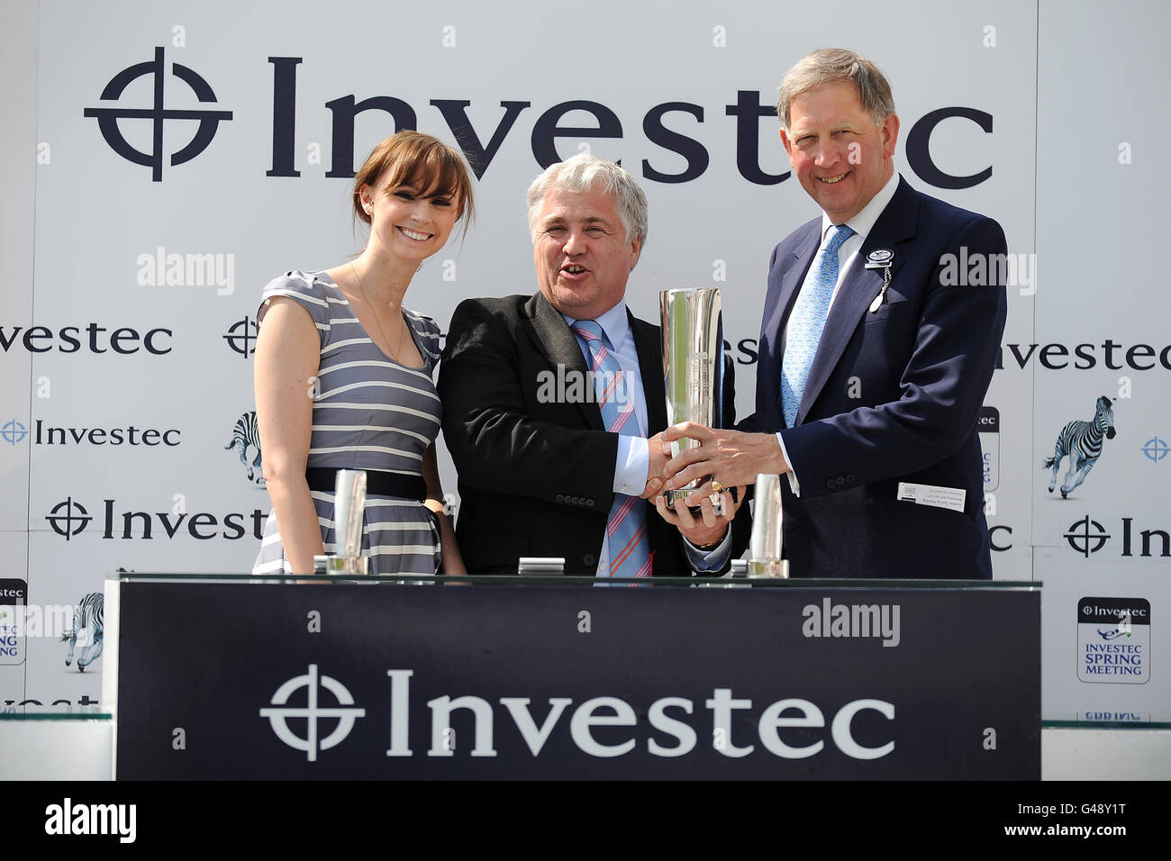 Rugby player stuart presents trophy alongside epsom chairman anthony ...