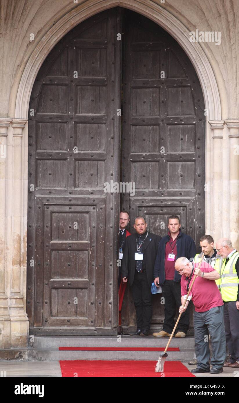 The red carpet is swept at the entrance to Westminster Abbey prior to ...