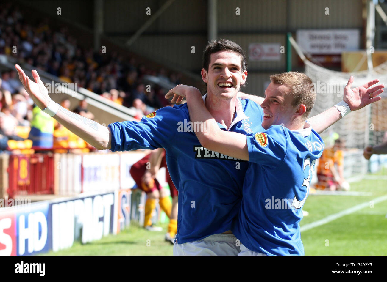 Rangers' Kyle Lafferty (left) celebrates scoring the opening goal ...