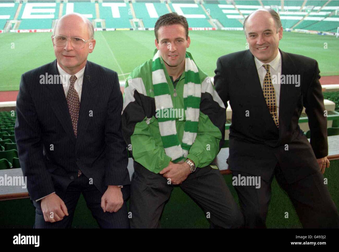Paul Lambert (centre), flanked by Celtic's managing director Fergus ...